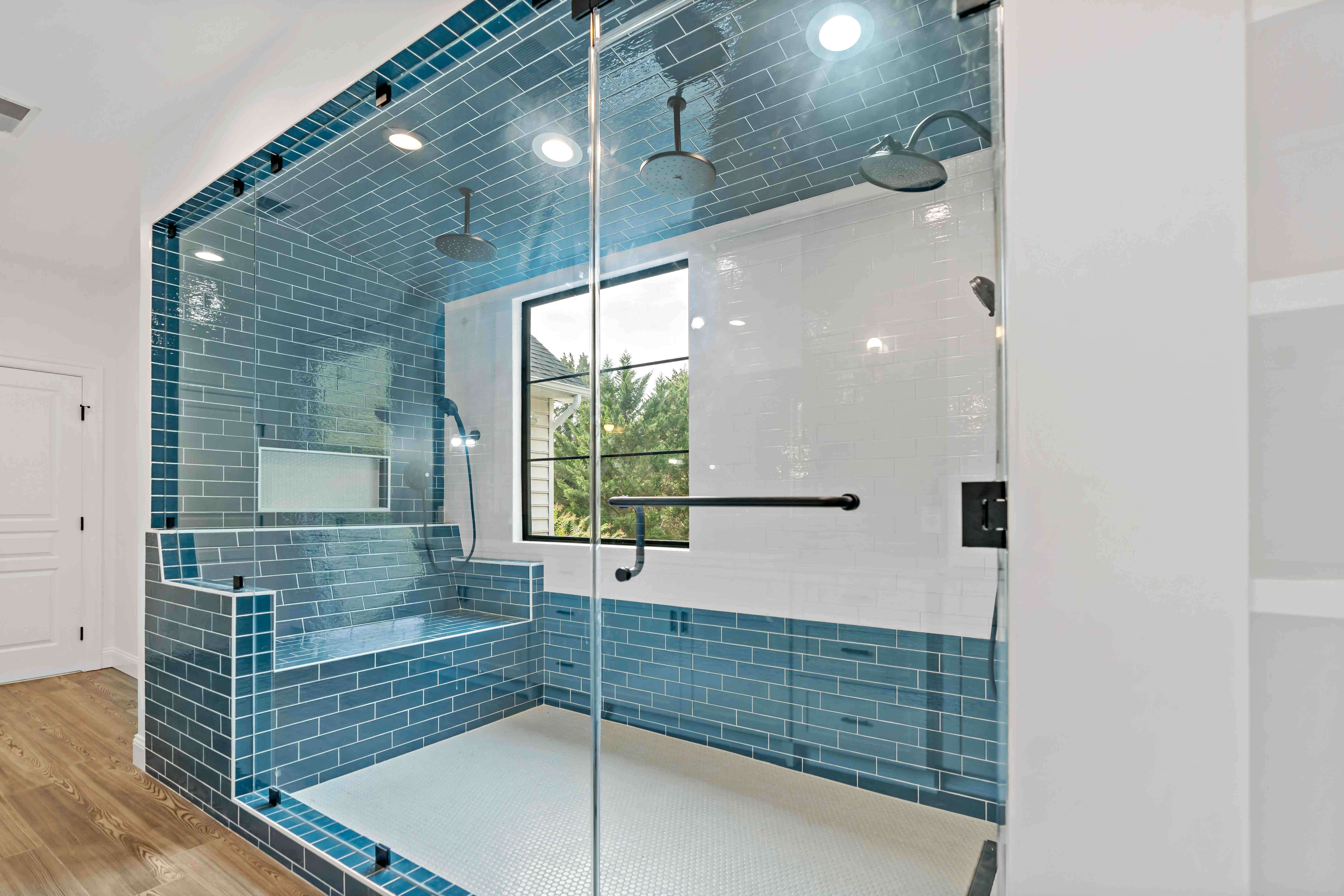 Stunning Blue Tile, Shower Bench, and Steam Shower Functionality ...